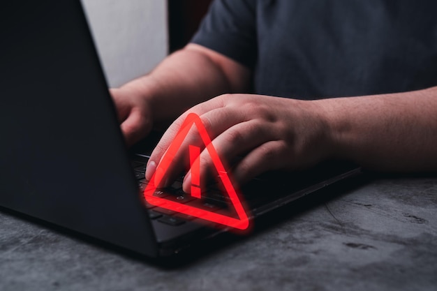 Premium Photo Woman Use Laptop With Hologram Warning Sign For