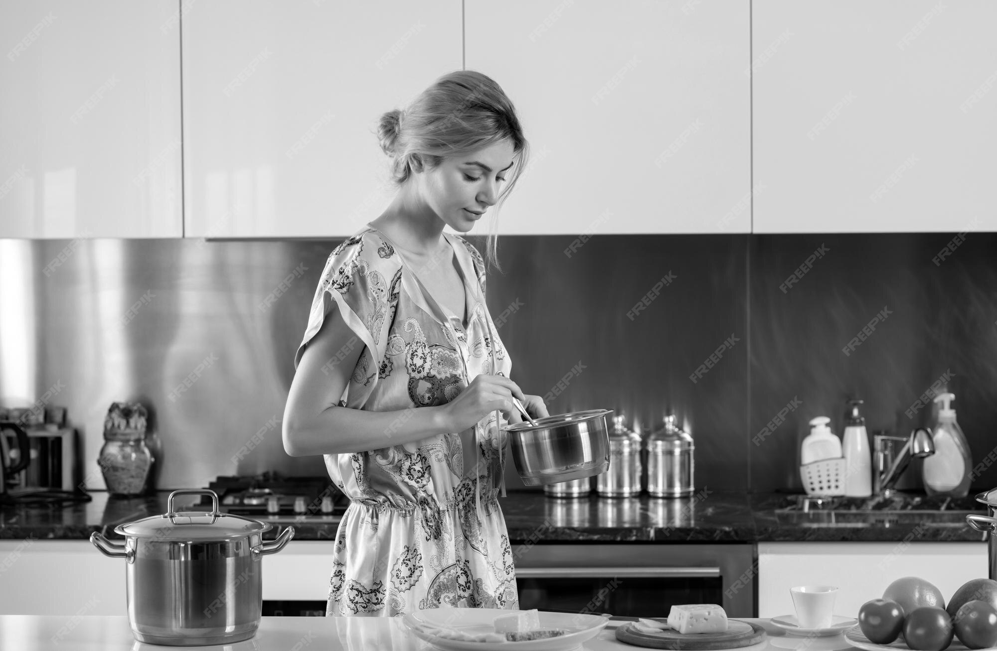 Premium Photo Woman With Cooking Pot In A Kitchen Sexy Housewife On Morning Housework
