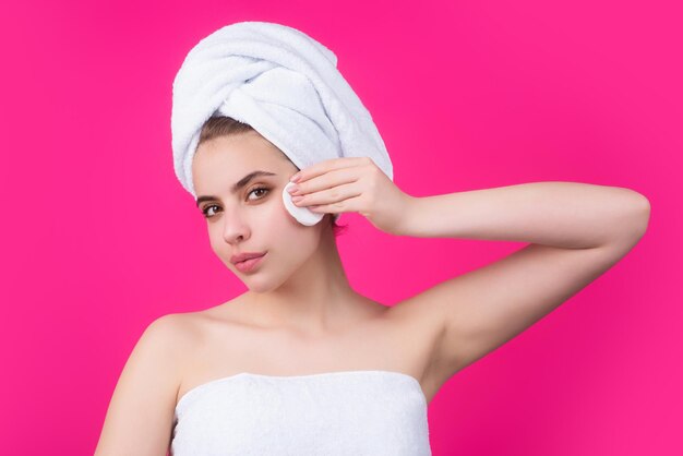 Premium Photo Woman With Cotton Pad Toner For Cleaning Make Up Clean