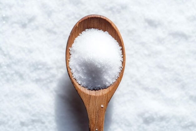 Premium AI Image | a wooden spoon filled with salt Premium AI Image | a wooden spoon filled with salt
