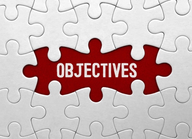 Premium Photo | Word objectives on red puzzle background Premium Photo | Word objectives on red puzzle background