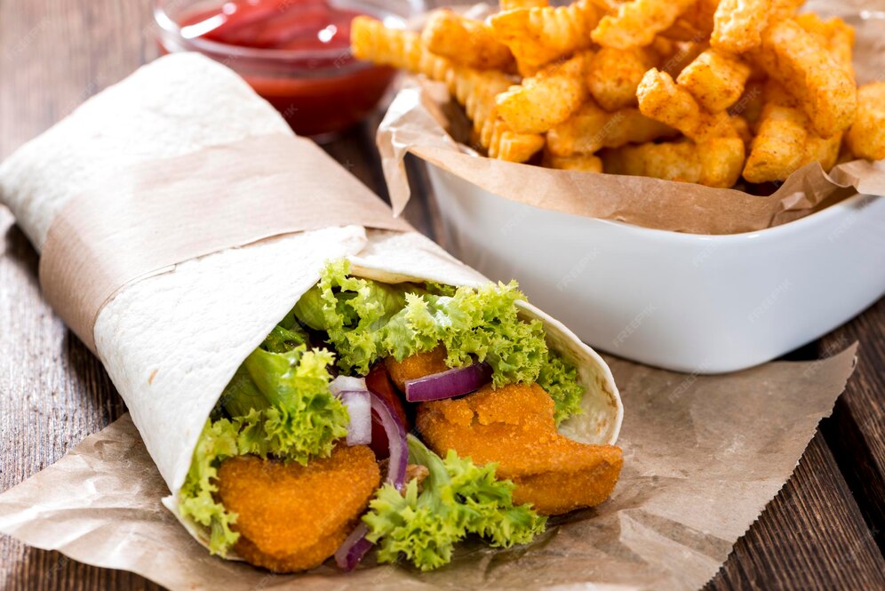 Premium Photo | Wrap with fried chicken Premium Photo | Wrap with fried chicken
