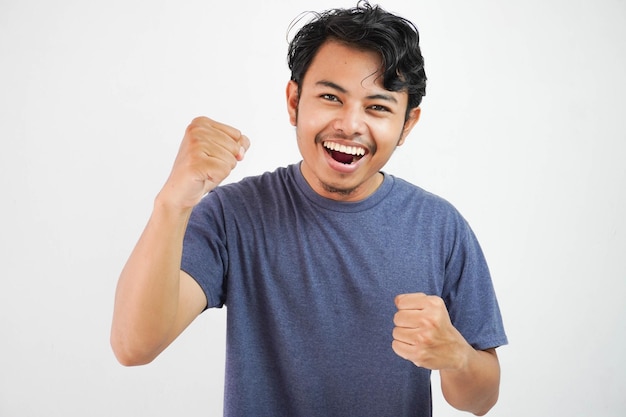 Premium Photo | Young asian man very happy and excited doing winner ... Premium Photo | Young asian man very happy and excited doing winner ...