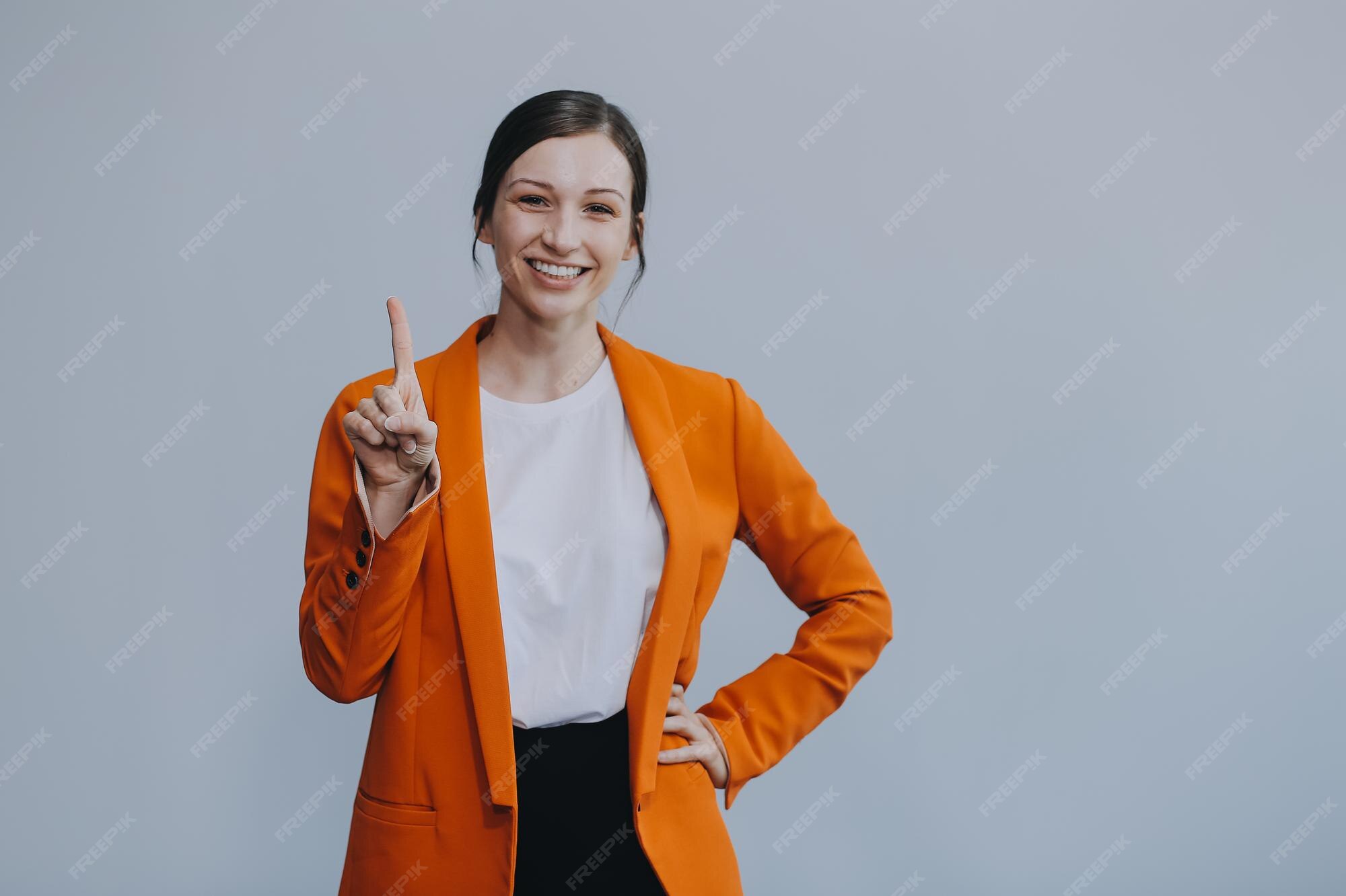 Premium Photo A Young Asian Woman With A Happy Successful Expression