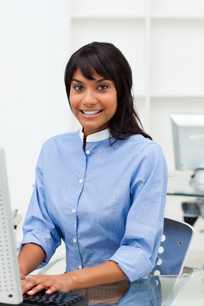 Premium Photo | Young businesswoman working at a computer Premium Photo | Young businesswoman working at a computer