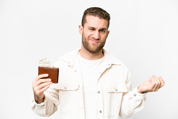 Premium Photo | Young handsome blonde man holding a wallet over ... Premium Photo | Young handsome blonde man holding a wallet over ...