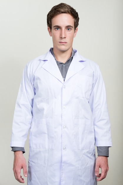 Premium Photo | Young handsome man doctor Premium Photo | Young handsome man doctor
