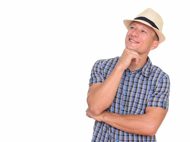 Premium Photo | Young happy man thinking isolated Premium Photo | Young happy man thinking isolated