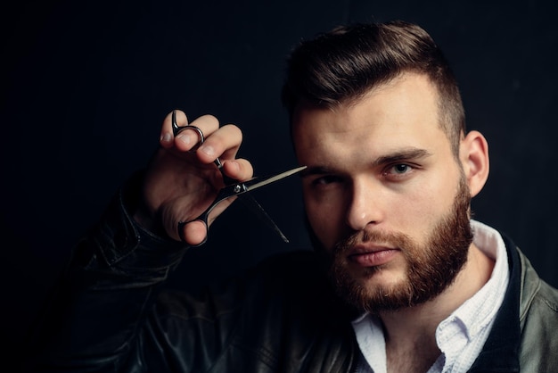 Premium Photo Young Sexy Man Portrait Of Guy With Barber Scissors For Barber Shop Modern