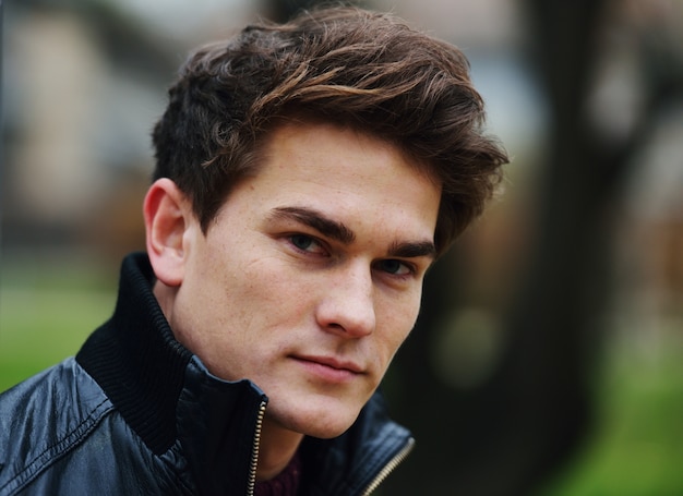 Premium Photo | Young stylish guy in park posing Premium Photo | Young stylish guy in park posing