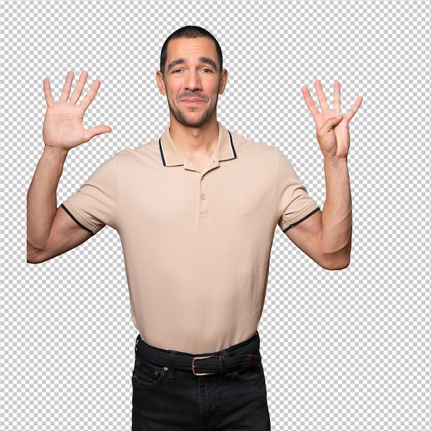 Premium PSD | Happy young man doing a number nine gesture with his hands Premium PSD | Happy young man doing a number nine gesture with his hands