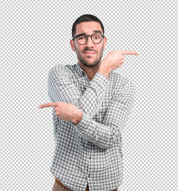 Premium PSD | Young man pointing Premium PSD | Young man pointing