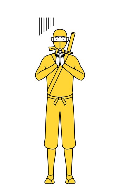 Ein als Ninja verkleideter Mann entschuldigt sich mit den Händen vor ... Ein als Ninja verkleideter Mann entschuldigt sich mit den Händen vor ...
