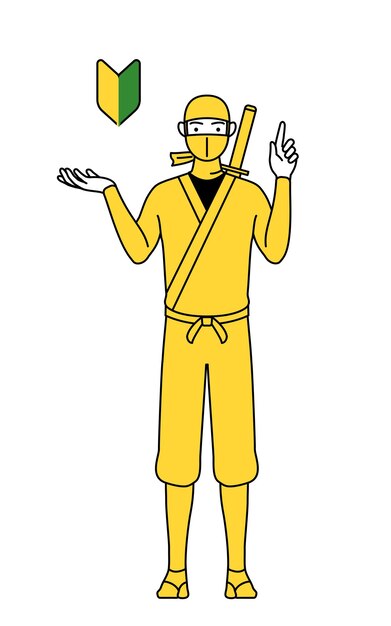 Ein als Ninja verkleideter Mann zeigt das Symbol für junge Blätter ... Ein als Ninja verkleideter Mann zeigt das Symbol für junge Blätter ...