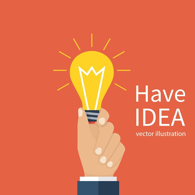 Empresário segurando uma lâmpada como símbolo de ideias. tenha um ... Empresário segurando uma lâmpada como símbolo de ideias. tenha um ...